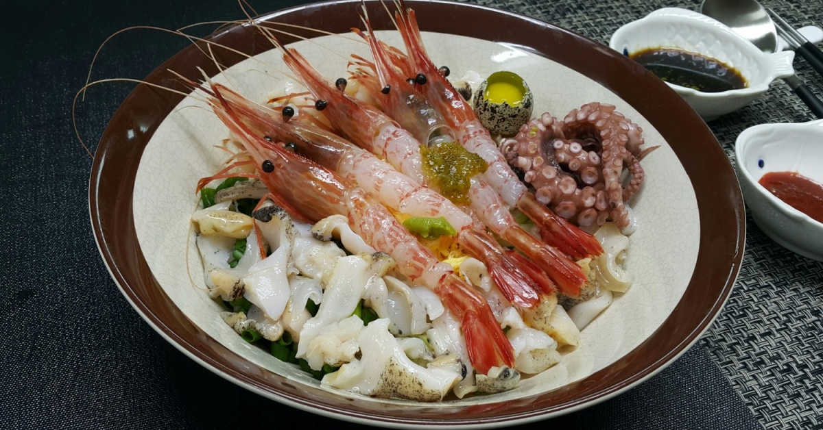 Fresh Dokdo flower shrimp, conch, and octopus seafood over rice~